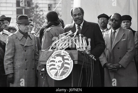 A military official addresses an audience from a podium, providing ...