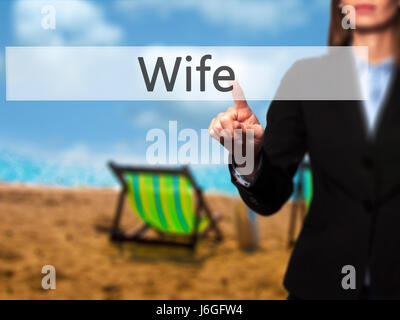 Wife - Businesswoman pressing high tech modern button on a virtual ...