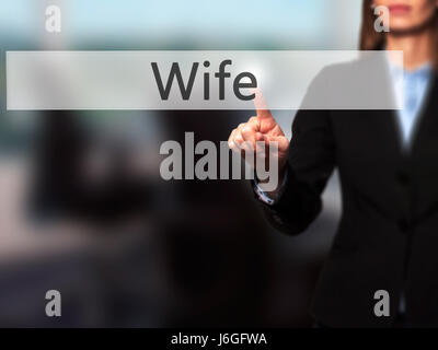 Wife - Businesswoman pressing high tech modern button on a virtual ...