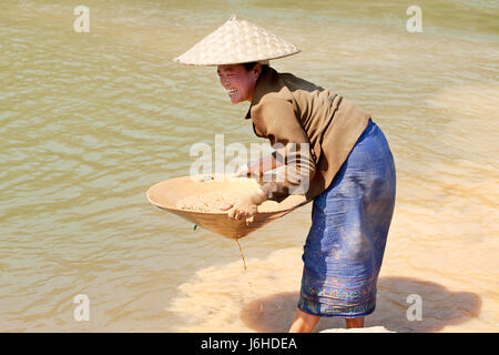 asia gold rush gold washer gold river water woman stone asia portrait ...