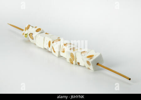 gourmet,candy,brochette nougats white,white background Stock Photo - Alamy