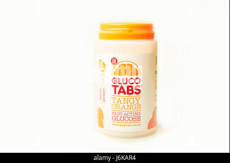 Tub of Gluco Tabs glucose chewable orange energy tablets Stock Photo ...
