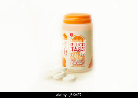 Tub of Gluco Tabs glucose chewable orange energy tablets Stock Photo ...
