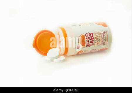 Tub of Gluco Tabs glucose chewable orange energy tablets Stock Photo ...