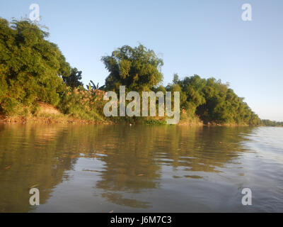 This image shows the riverbanks of Cansinala, located in Apalit ...