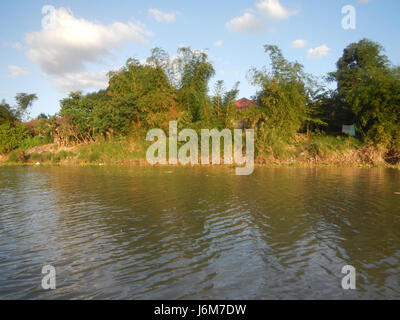 This image shows the riverbanks of Cansinala in Apalit, Pampanga ...
