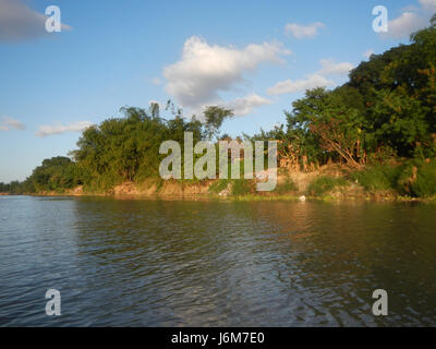 The riverbanks of Cansinala, Apalit, and the San Miguel Bridge near San ...