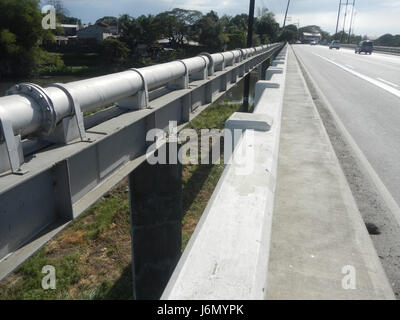 This image depicts the Santa Maria Bridge 9, located in Bulacan ...