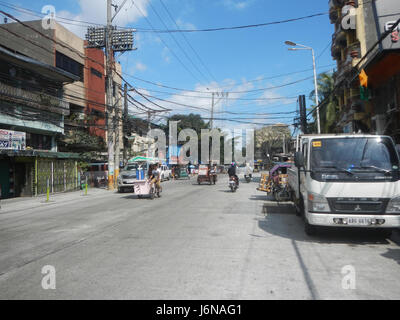 This image showcases Tayuman Street in the Santa Cruz area of Manila ...