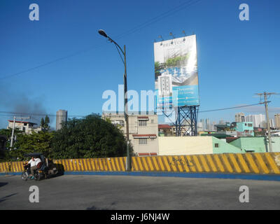 This image shows the Marikina Bridge, spanning the Marikina River in ...