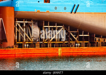 Big ship - rear view with propeller under repair Stock Photo - Alamy