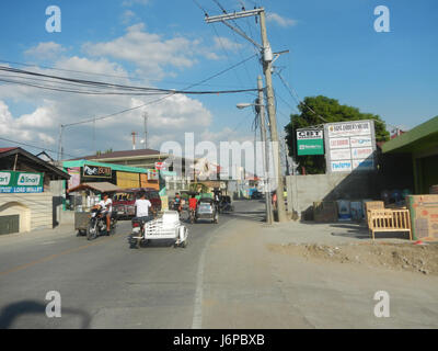 This image shows Candaba Town Proper, featuring its church and school ...