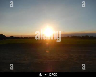 This image captures a stunning sunset view of the Bocaue River Bridge ...