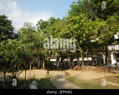 The image shows the Pasig City Hall Compound, featuring several ...