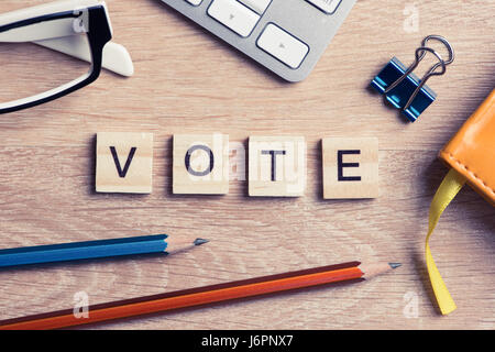 Elements of game with letters spelling business keywords on workplace ...