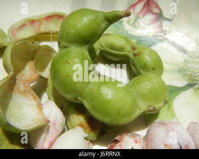 This image showcases various fruits native to the Philippines ...