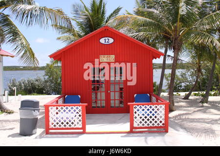colorful beach huts in the bahamas Stock Photo - Alamy