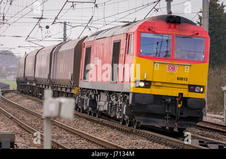 DB Cargo class 60 diesel locomotive hauling a long freight train of oil ...