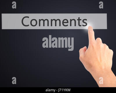 Comments - Hand pressing a button on blurred background concept ...