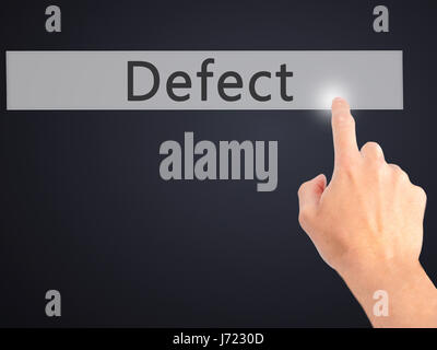 Defect - Hand pressing a button on blurred background concept ...