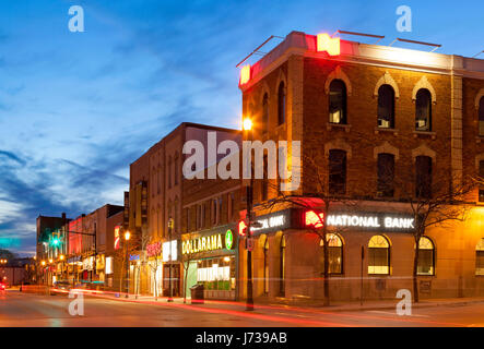Downtown Barrie in the spring along Dunlop Street East at dusk. Barrie ...