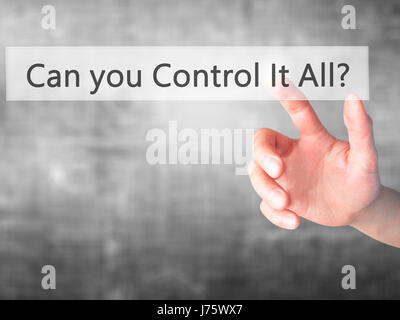 Can you Control It All ? - Hand pressing a button on blurred background ...