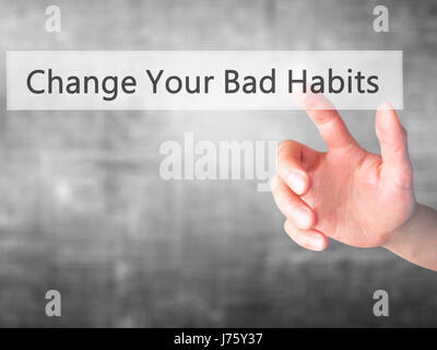 Change Your Bad Habits - Hand pressing a button on blurred background ...