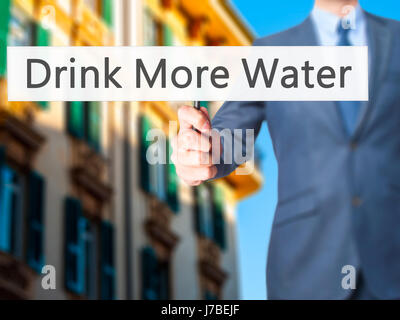 drink more water - hydration reminder - handwriting on blue sticky note ...