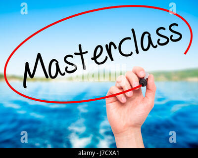 Man Hand writing Masterclass with black marker on visual screen ...