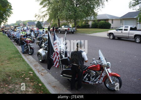 A US veteran riding his motorcycle in the Veterans Day Parade Milwaukee ...