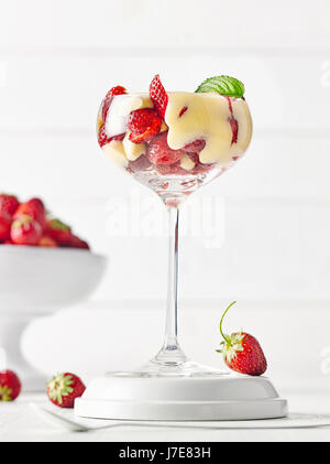 Ice cream collection in bowls on wooden background Stock Photo - Alamy