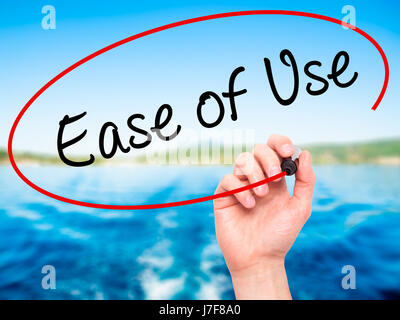 Hand writing sign Ease Of Use. Internet Concept User friendly easy to ...