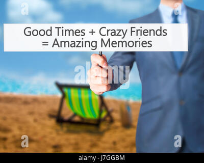 Good Times Crazy Friends Amazing Memories - Businessman hand holding ...