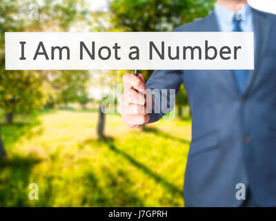 I Am Not a Number - Businessman hand holding sign. Business, technology ...