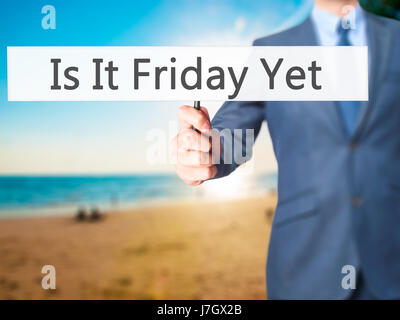 Is It Friday Yet - Businessman hand holding sign. Business, technology ...