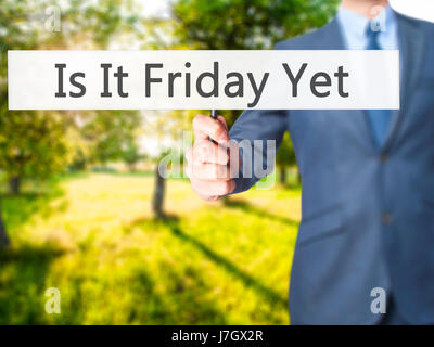 Is It Friday Yet - Businessman hand holding sign. Business, technology ...