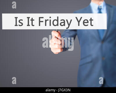 Is It Friday Yet - Businessman hand holding sign. Business, technology ...