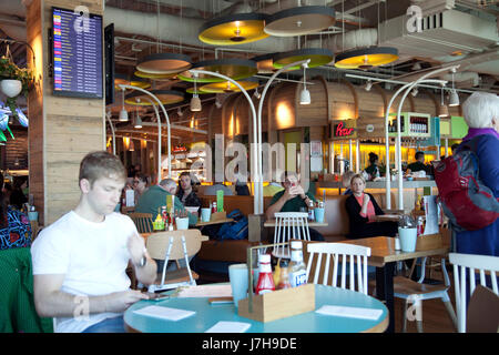 Restaurant in Gatwick Airport with Diners - UK Stock Photo - Alamy