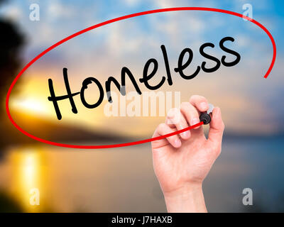 Man Hand writing Homeless with black marker on visual screen. Isolated ...