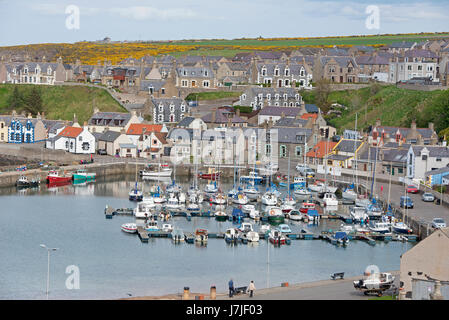 Findochty harbour with the town and Church beyond Stock Photo - Alamy