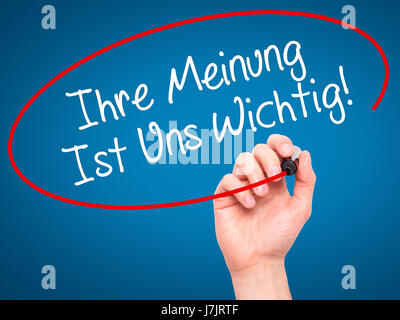 Man Hand writing Ihre Meinung Ist Uns Wichtig! (Your Opinion is Stock ...