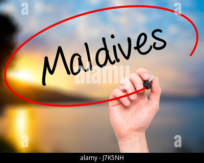 Man Hand writing Maldives with black marker on visual screen Stock ...