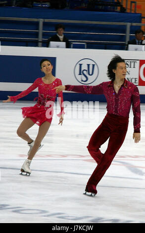 Qing Pang and Jian Tong of China performing the pairs short program ...