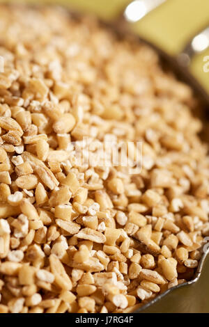 uncooked pinhead oats, also called steel cut oats Stock Photo - Alamy