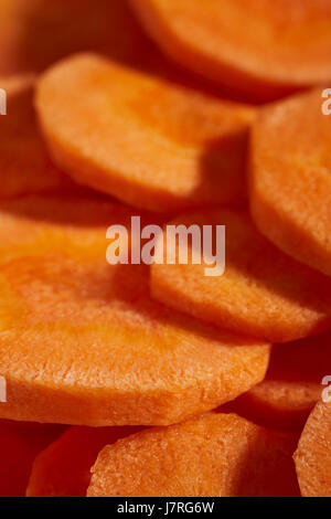 sliced raw carrots, sometimes called carrot coins Stock Photo - Alamy