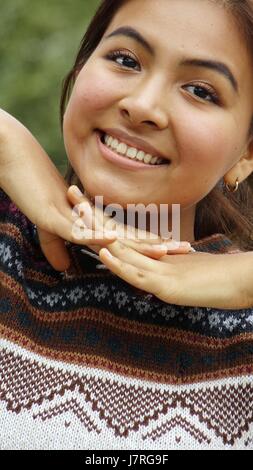Adorable hispanic child girl smiling happy. Standing with smile on face ...