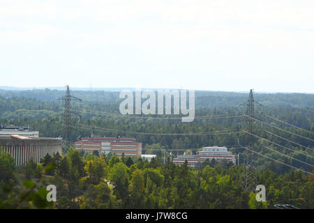 Powerline in forest landscape Stock Photo - Alamy