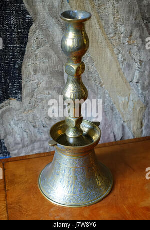 This candlestick, located at Kelmscott Manor in Oxfordshire, England ...