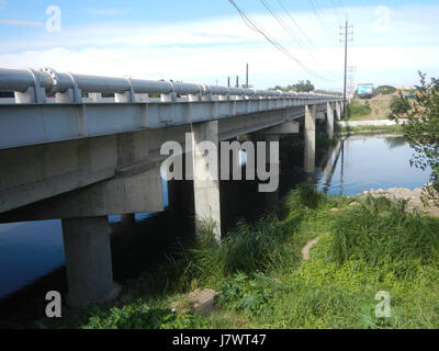 This image showcases the Santa Maria Bridge in Bulacan, which spans the ...