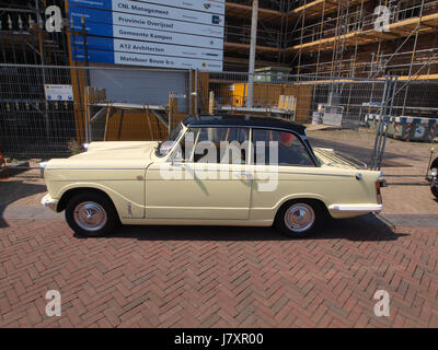 The 1963 Triumph Herald 1200 is a British compact car known for its ...
